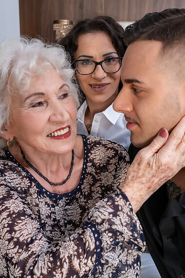 Horny Granny Gets It In A Threesome With A Tatooed Younger Couple